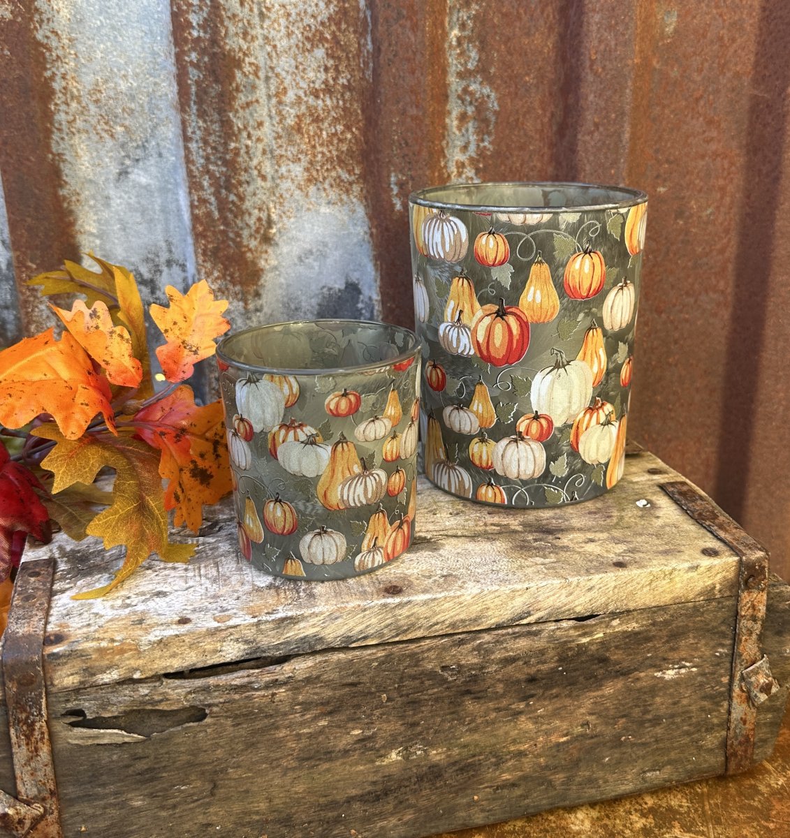 Ljuslykta pumpa med pumpor i olika nyanser - Höst